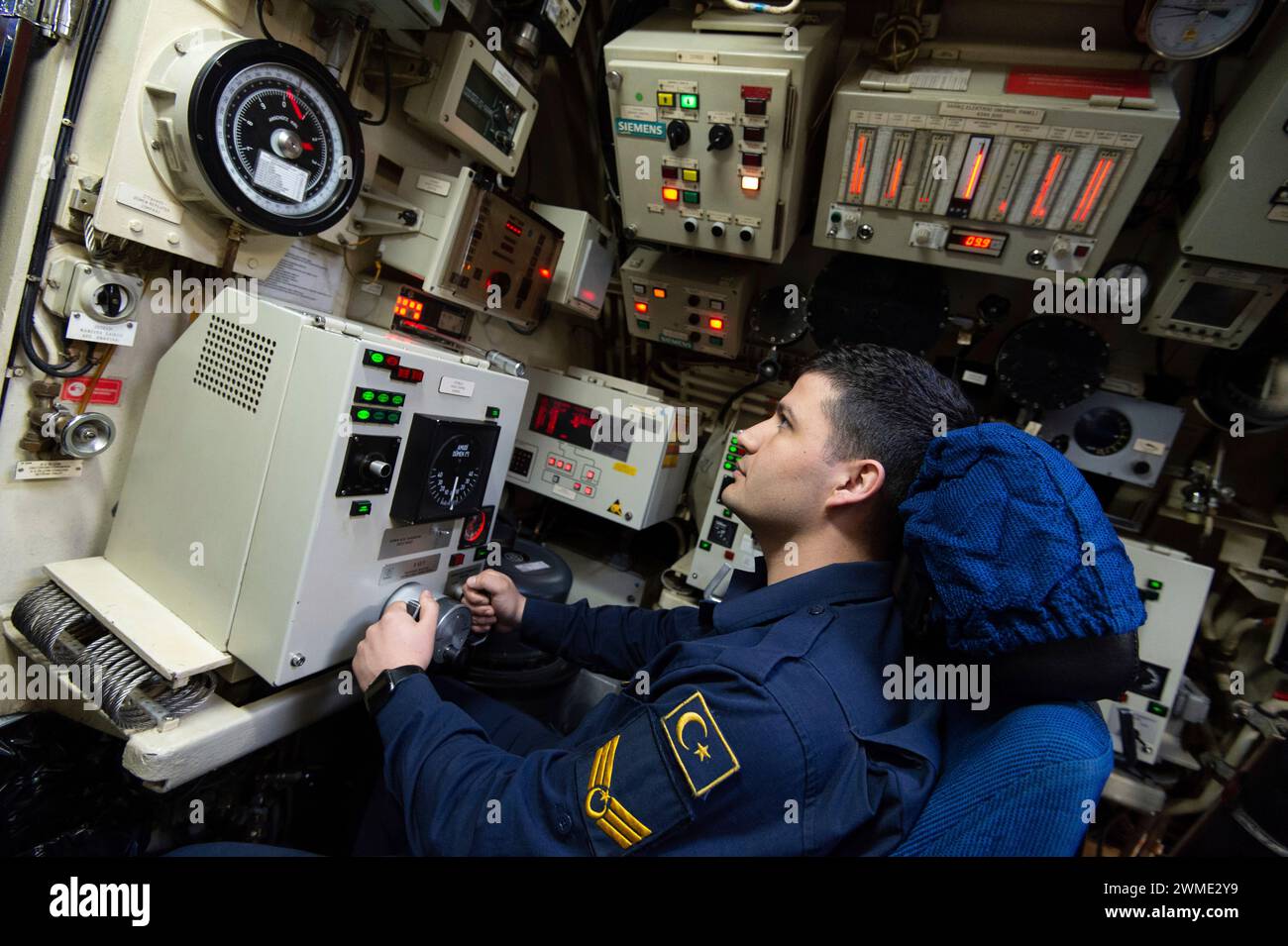 A sailor, name not available, shows the steering system of the Turkish ...