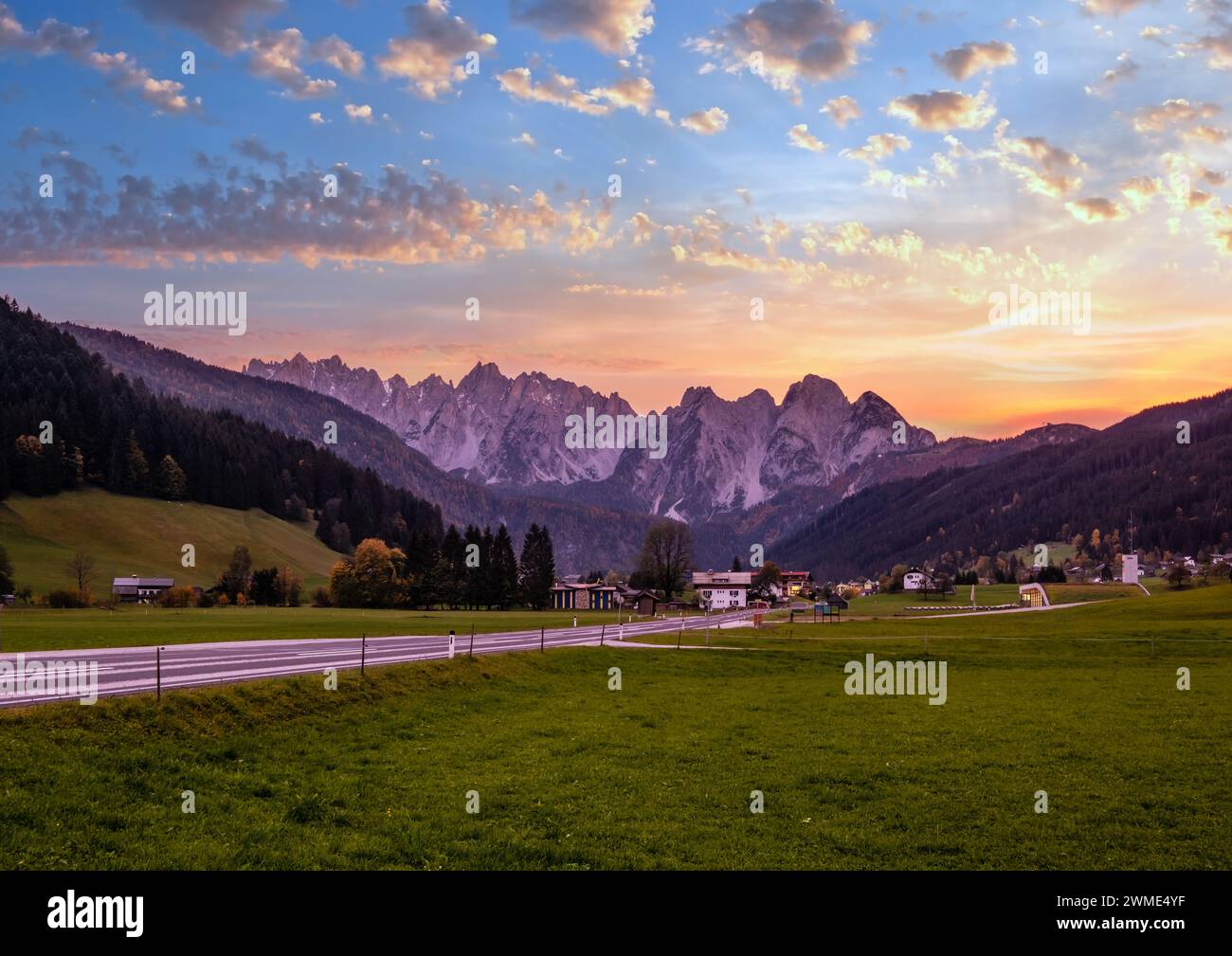 Sunset dusk autumn Alps mountain countryside panoramic sunny view ...