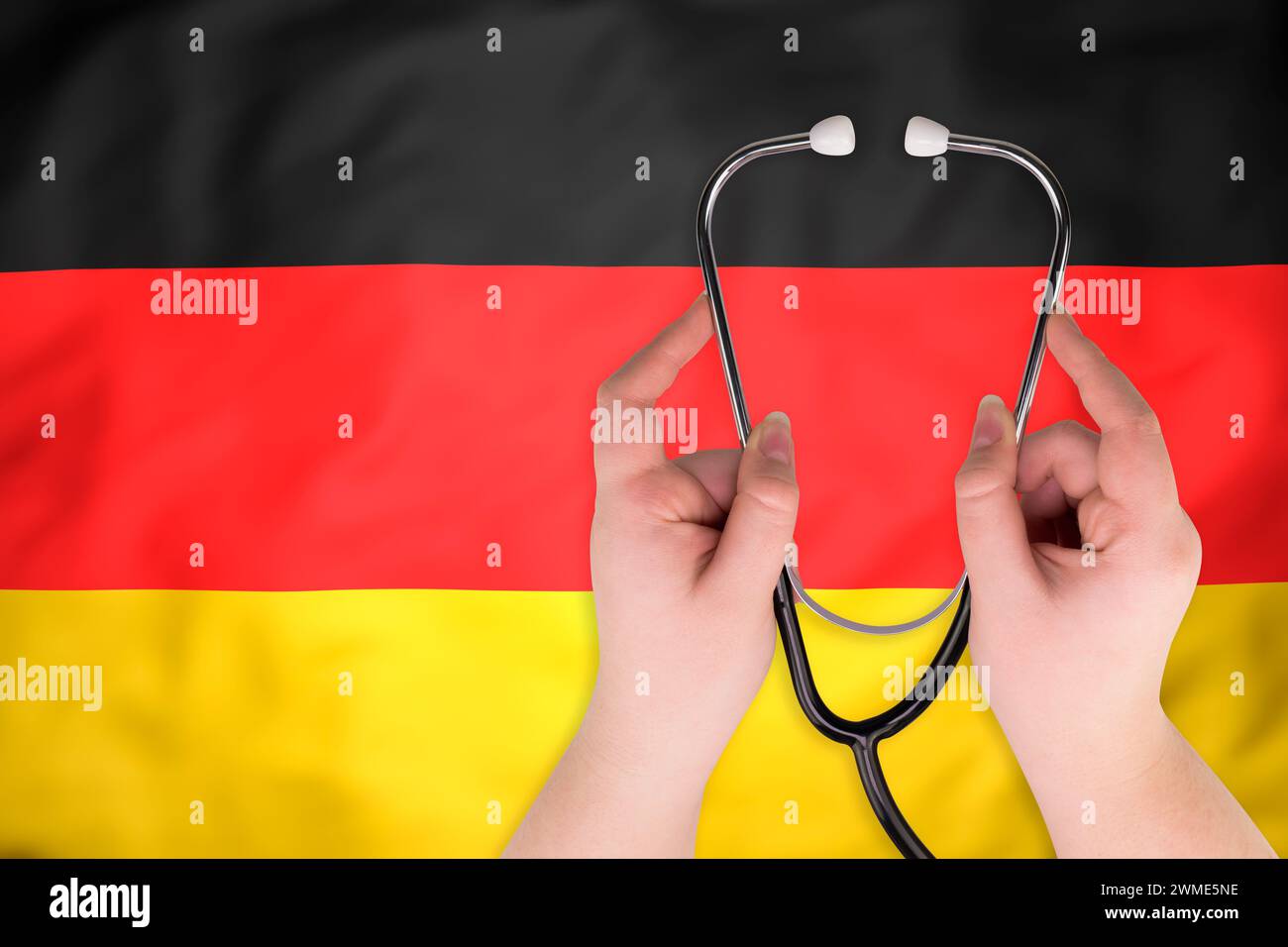 Medical stethoscope in hands (close-up) against the background of the ...