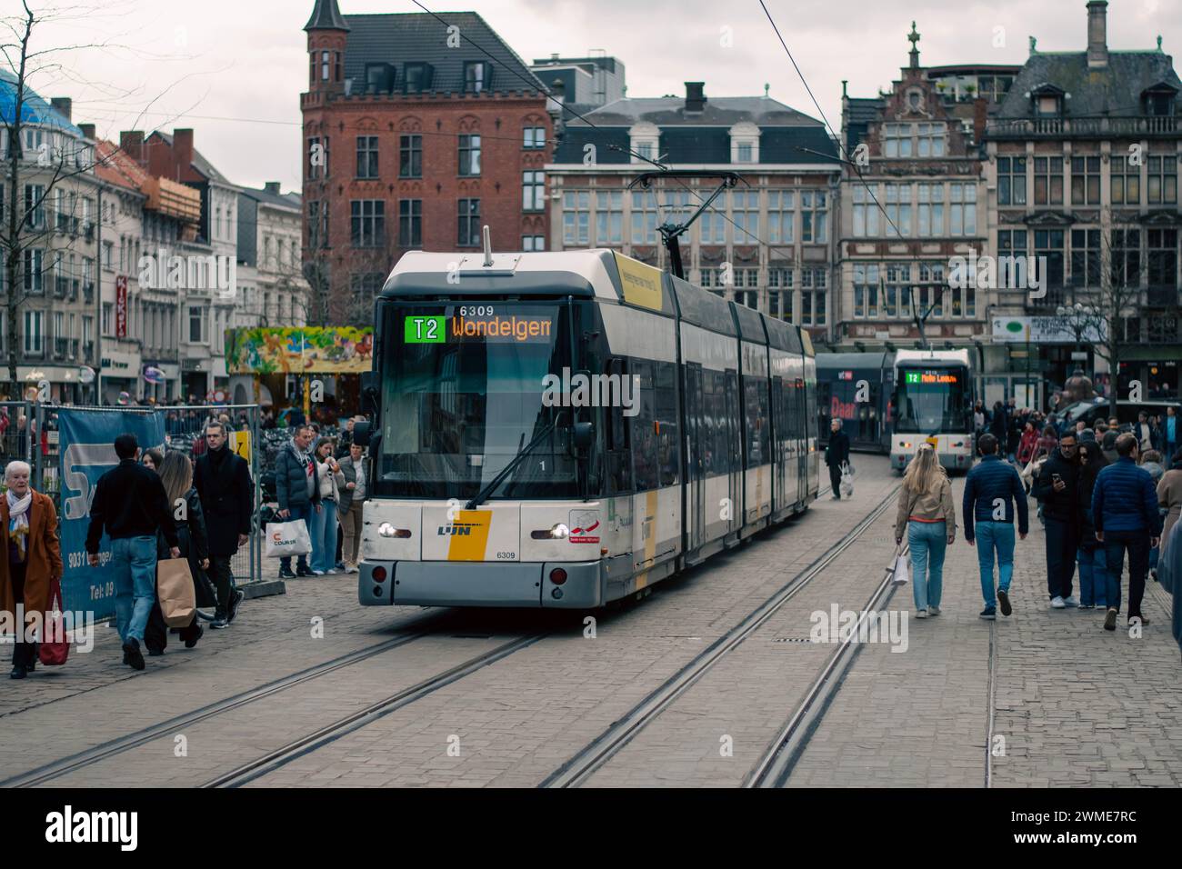 Gent, Belgium - January 31 2024: De Lijn tram in the busy street of ...