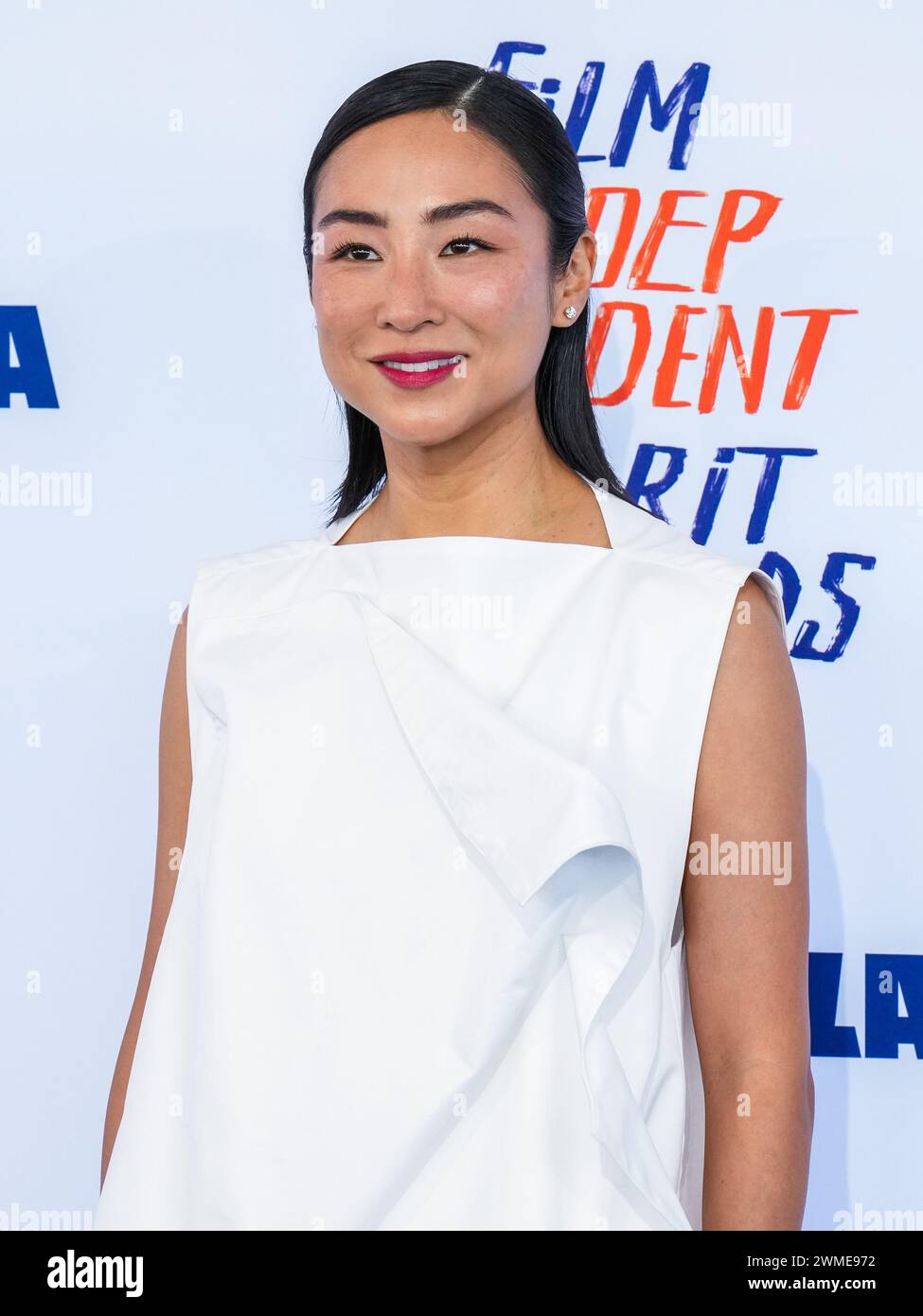 Los Angeles, USA. 25th Feb, 2024. Greta Lee walking on the red carpet ...