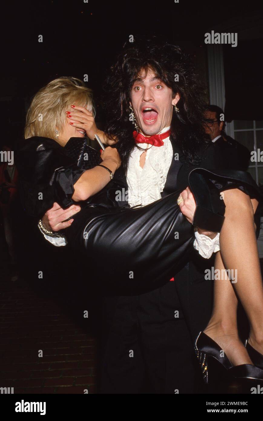 Tommy Lee and Heather Locklear at the Aaron Spelling Party March 11 ...