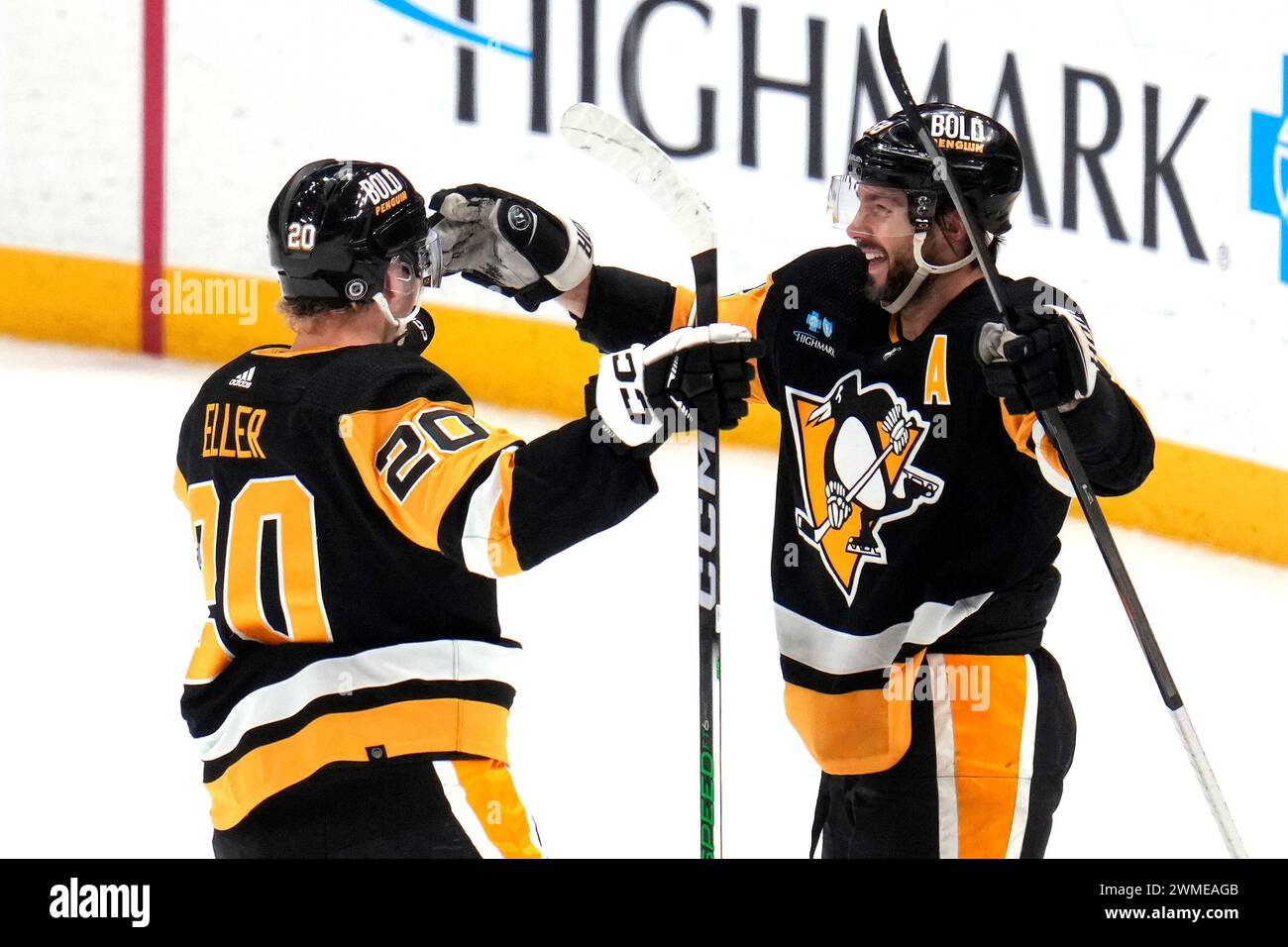 Pittsburgh Penguins' Kris Letang (58) celebrates with Lars Eller after ...