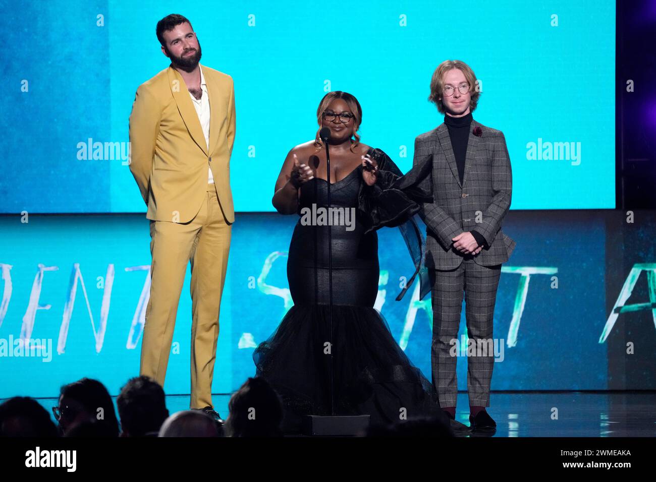 Robert Gladden, from left, Rashida Olayiwola, and David Brown present ...