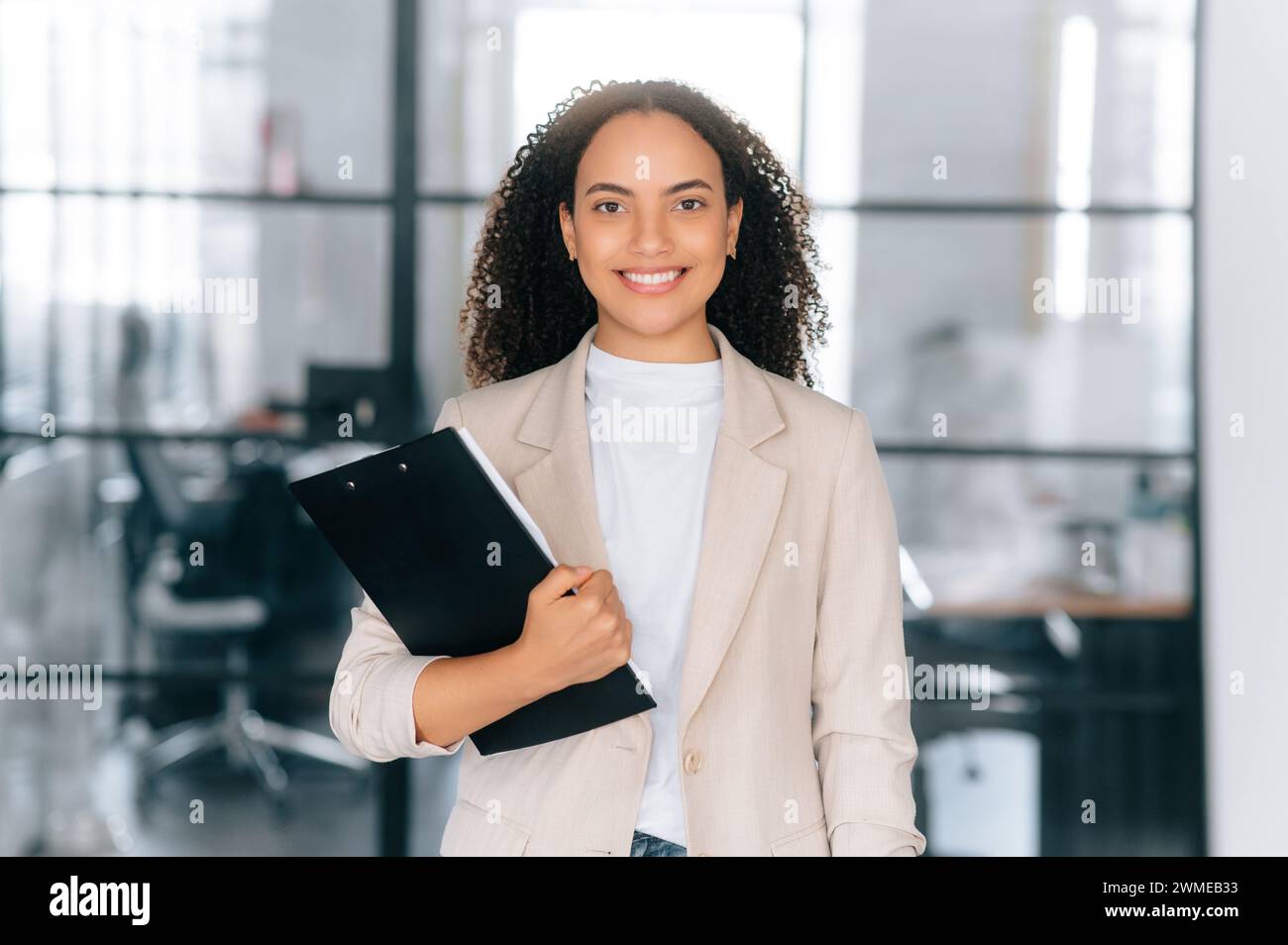 Female portrait. Gorgeous successful elegant brazilian or hispanic ...