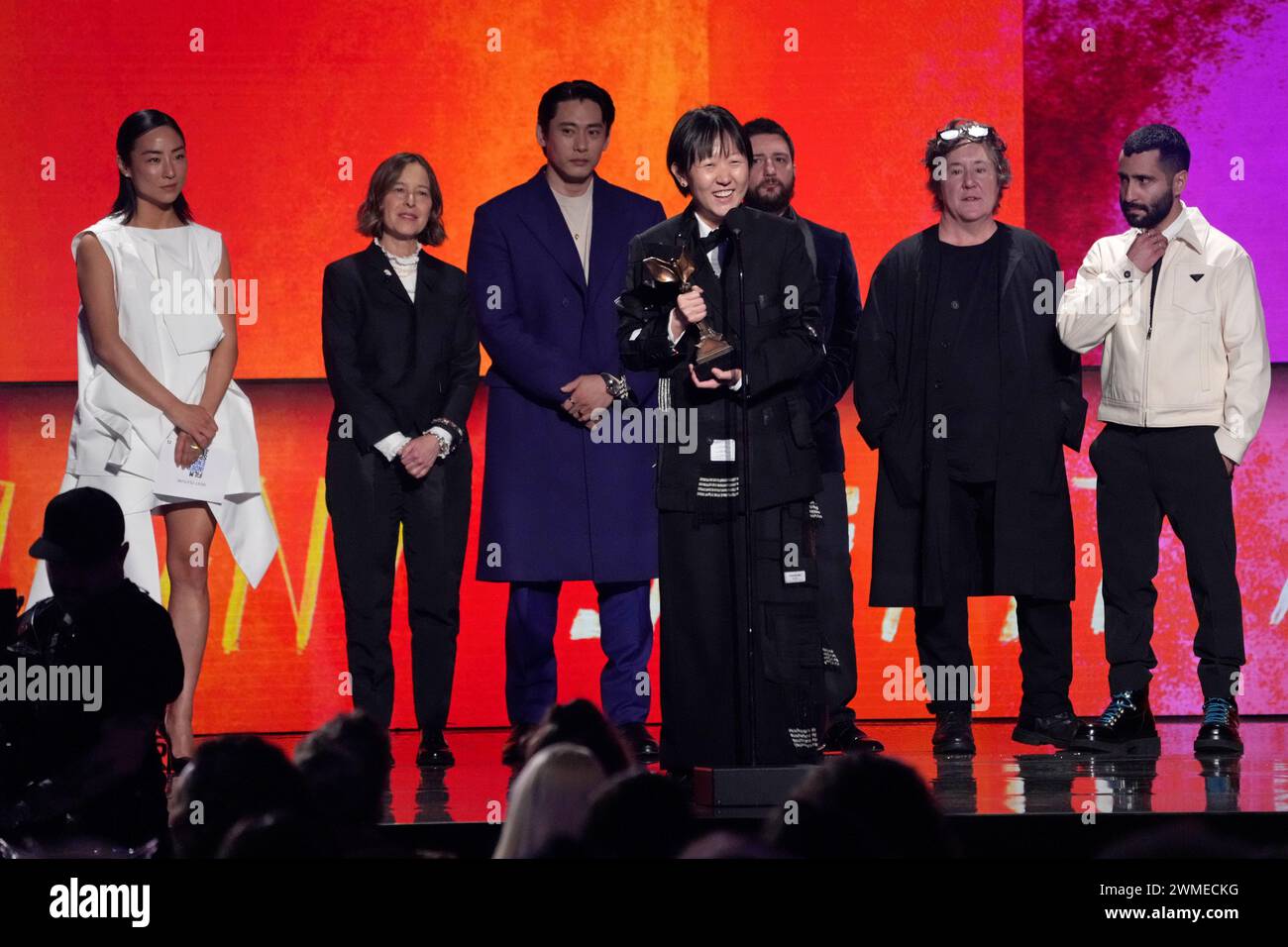 Greta Lee, from left, Pamela Koffler, Teo Yoo, Celine Song, center ...