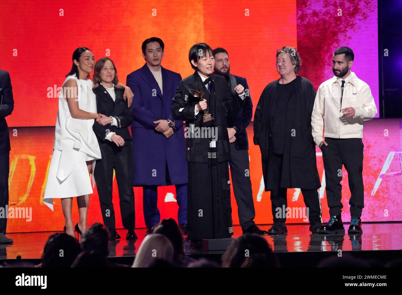 Greta Lee, from left, Pamela Koffler, Teo Yoo, Celine Song, center ...
