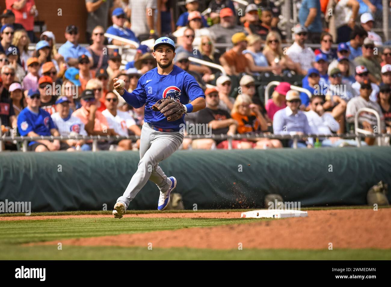 Chicago Cubs third baseman Nick Madrigal (1) throws the ball to first ...