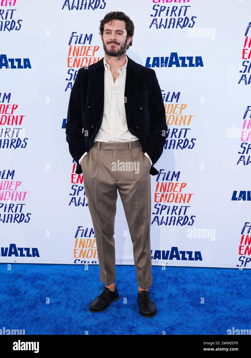 Los Angeles, USA. 25th Feb, 2024. Adam Brody walking on the red carpet ...