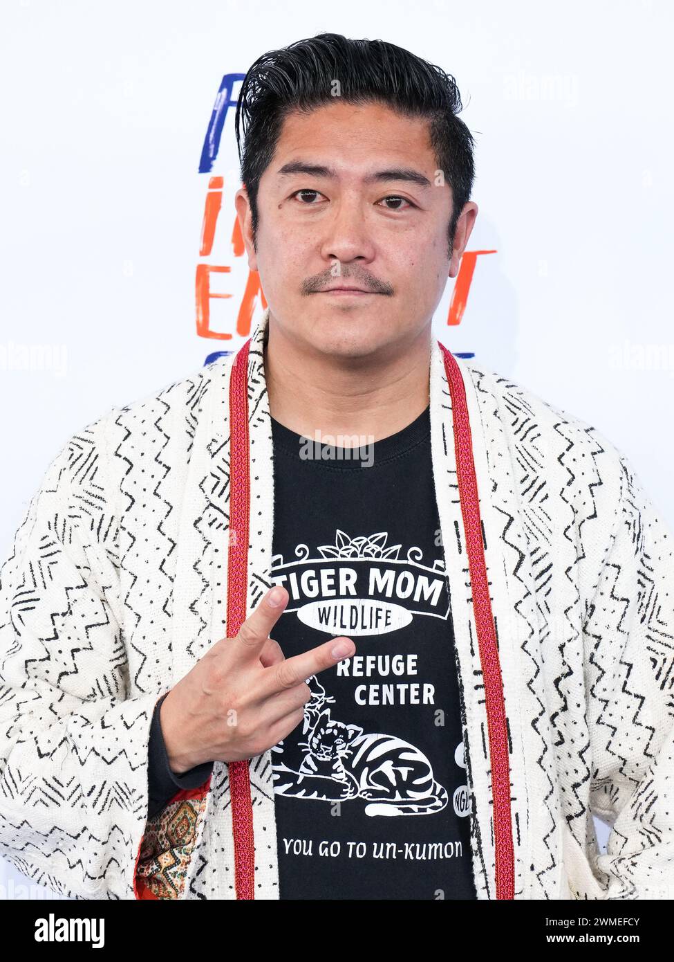 Los Angeles, USA. 25th Feb, 2024. Tze Chun walking on the red carpet at ...