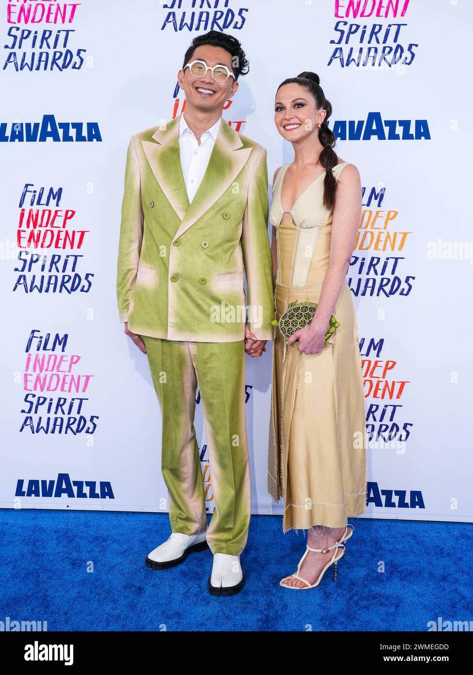 Los Angeles, USA. 25th Feb, 2024. Lee Sung Jin and Caitlin Solone Lee walking on the red carpet ...
