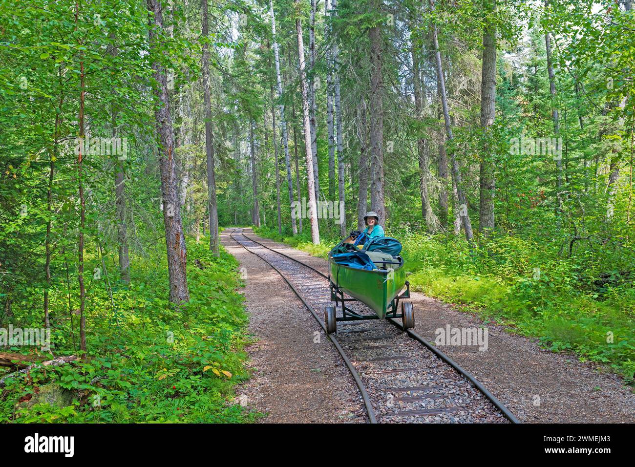 Portaging a Canoe on a Rail Portage in Prince Albert National Park in ...