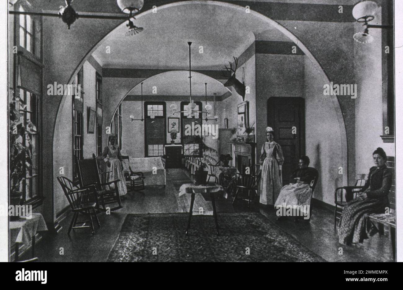 Ward at Department for Women Hospital. Interior view of a long room ...