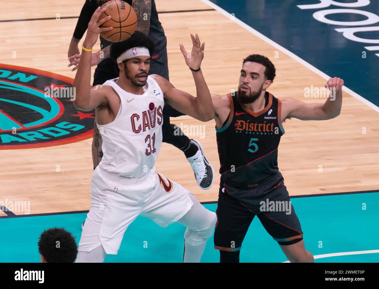 WASHINGTON, DC - FEBRUARY 25: Cleveland Cavaliers center Jarrett Allen (31) pulls the ball back ...
