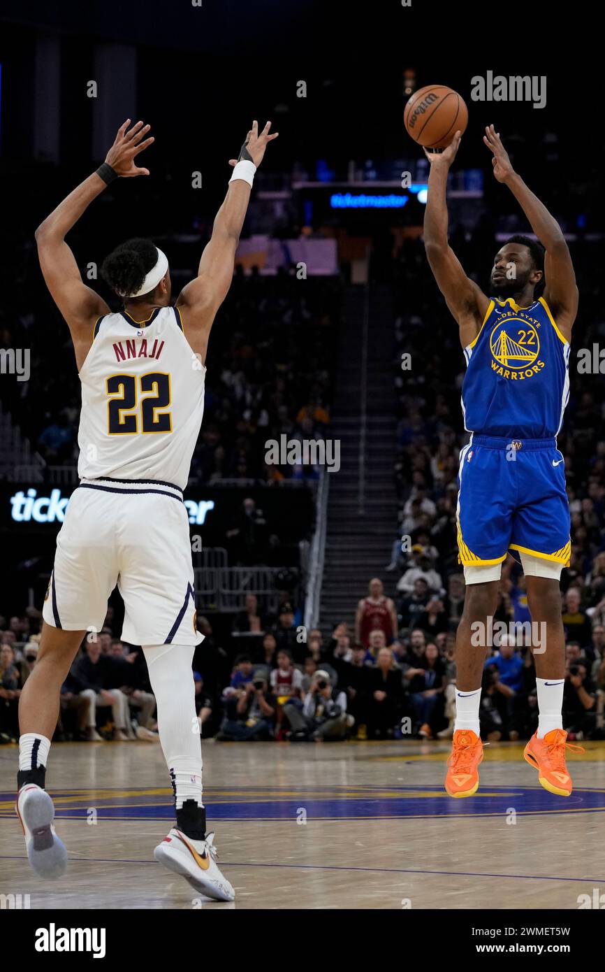 Golden State Warriors forward Andrew Wiggins, right, shoots a 3-point ...