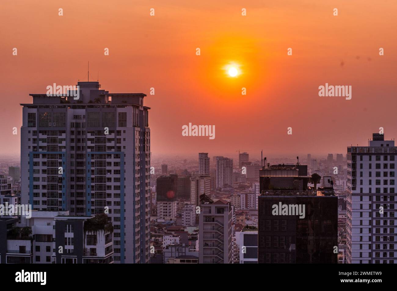 sunset over the Phnom Penh skyline, Cambodia. © Kraig Lieb Stock Photo ...