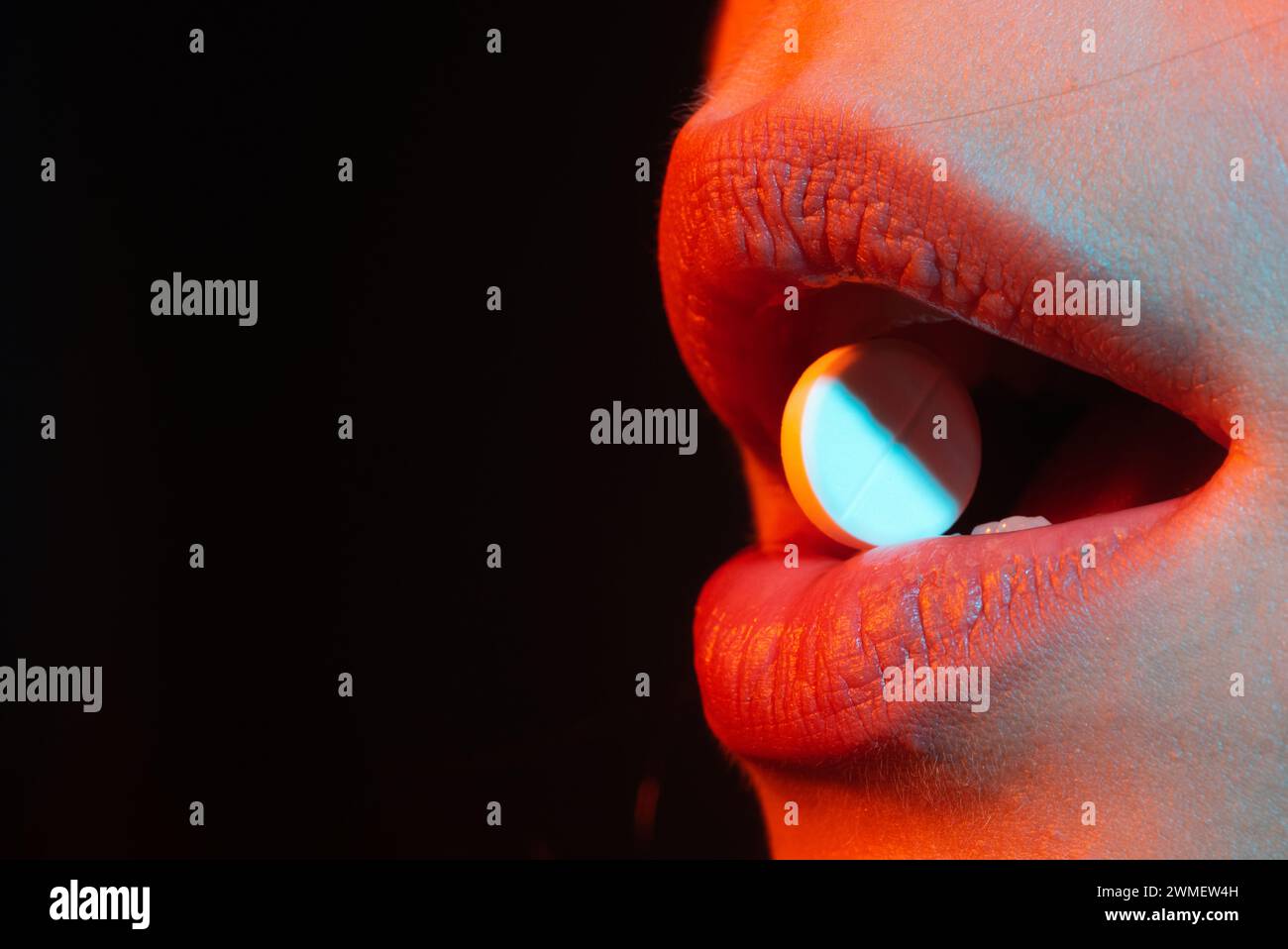 Pill in mouth close up. Woman taking pills, closeup. Sick ill woman ...