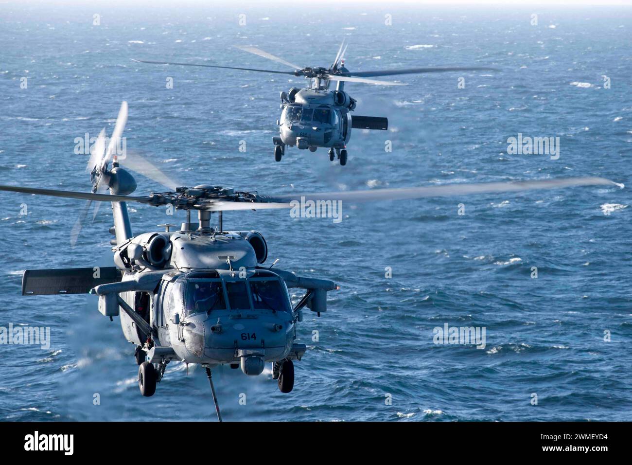 240421-N-CY569-1194 NORFOLK, Va. (FEB.. 21, 2024) Two MH-60S Sea Hawk ...