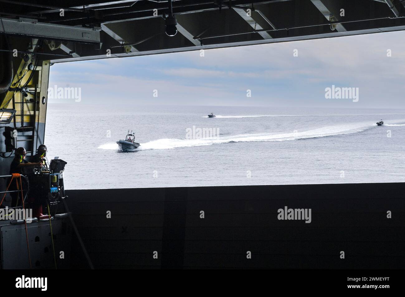 Three small boats manned by U.S. Navy Sailors assigned to Explosive ...