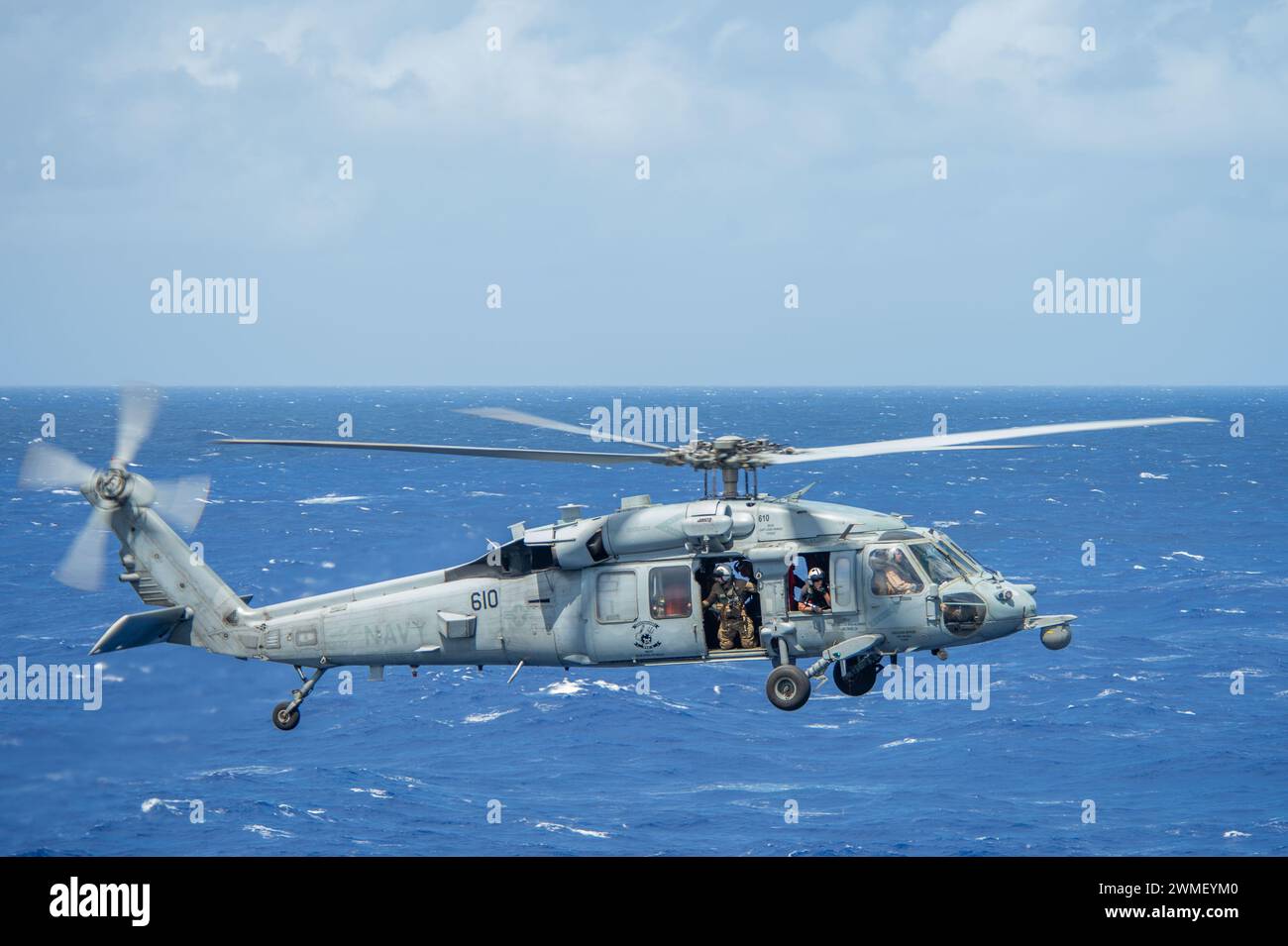 PHILIPPINE SEA (Feb. 20, 2024) An MH-60S Sea Hawk, attached to the ...