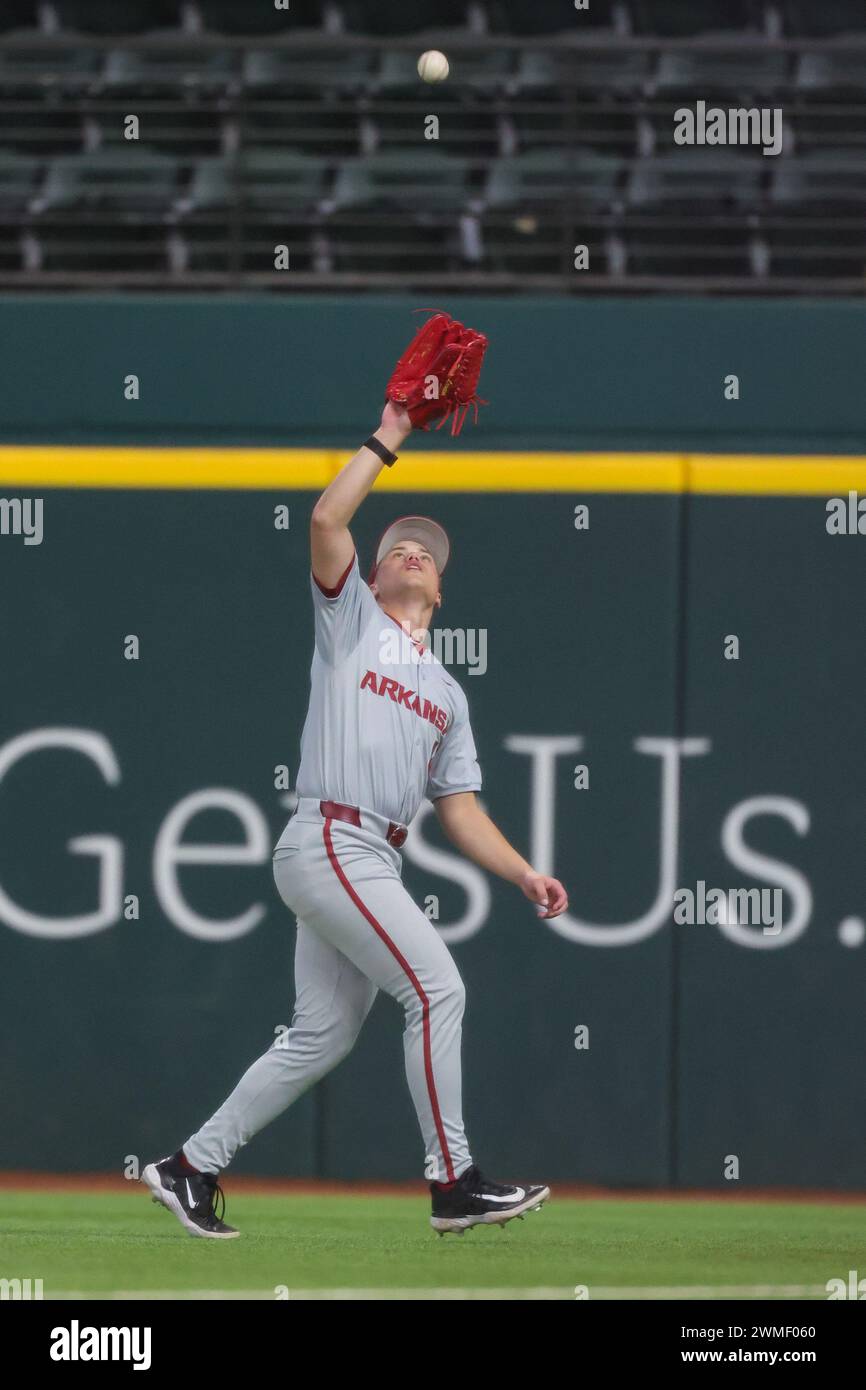 February 25, 2024: Ross Lovich #14 Arkansas right fielder moves over ...