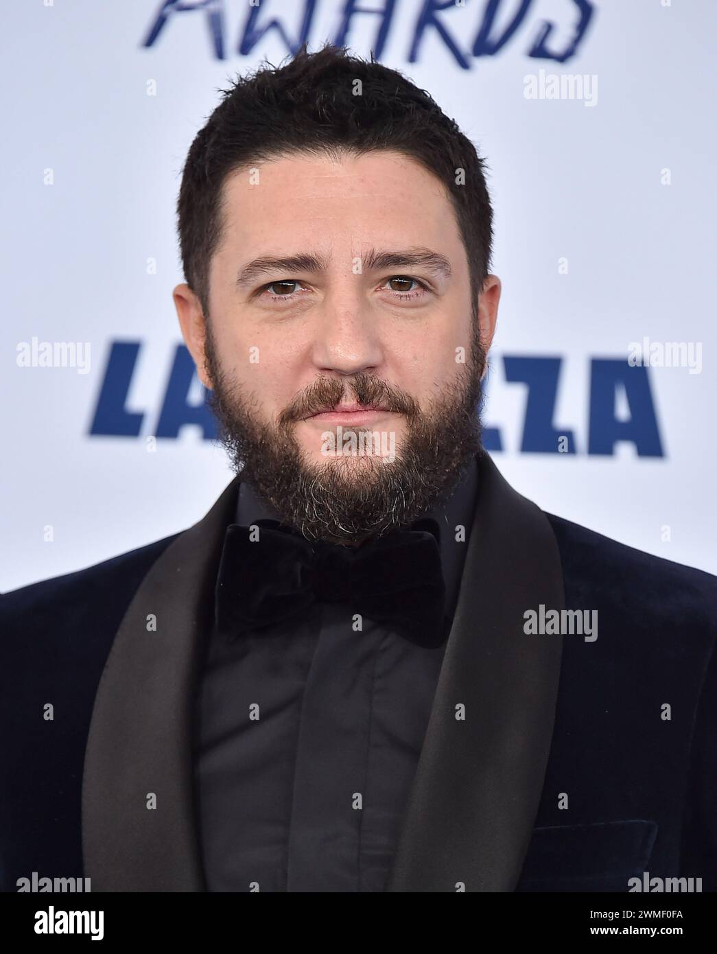 John Magaro arriving to the 2024 Film Independent Spirit Awards at the ...