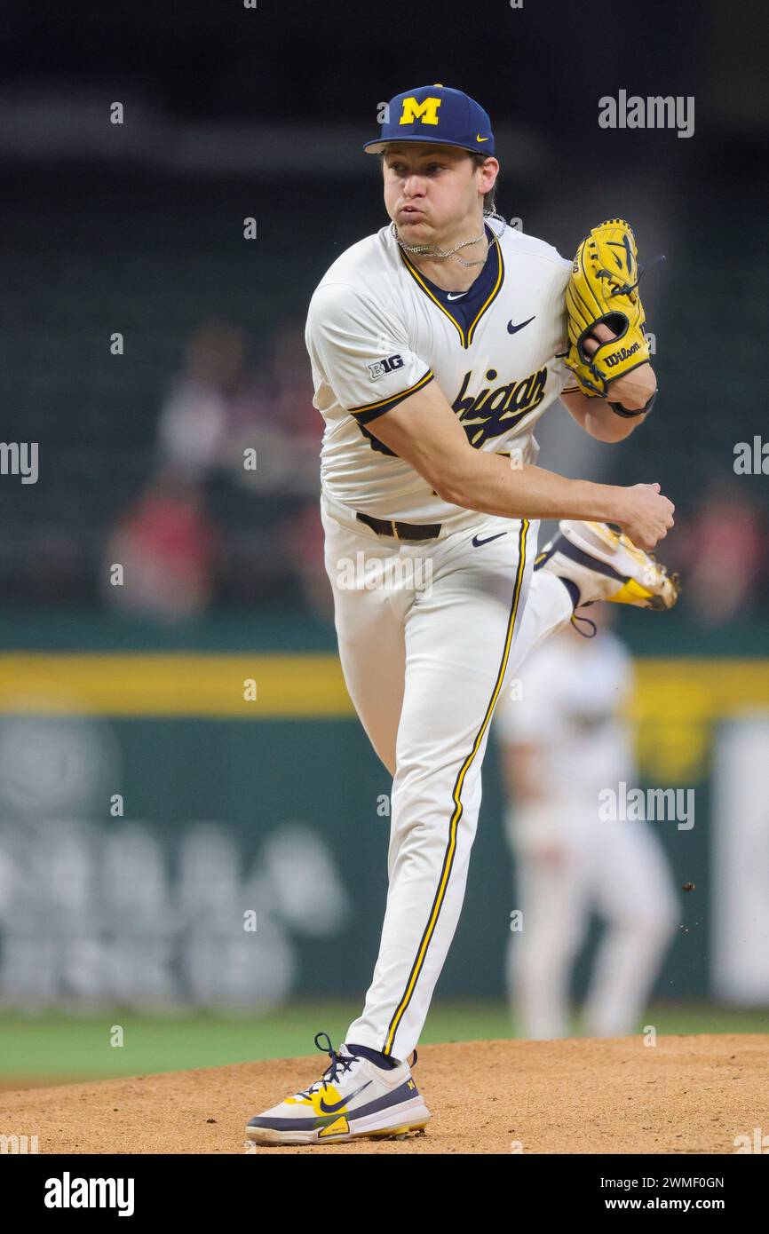 February 25, 2024: Dylan Vigue #27 Wolverines pitcher follows through ...