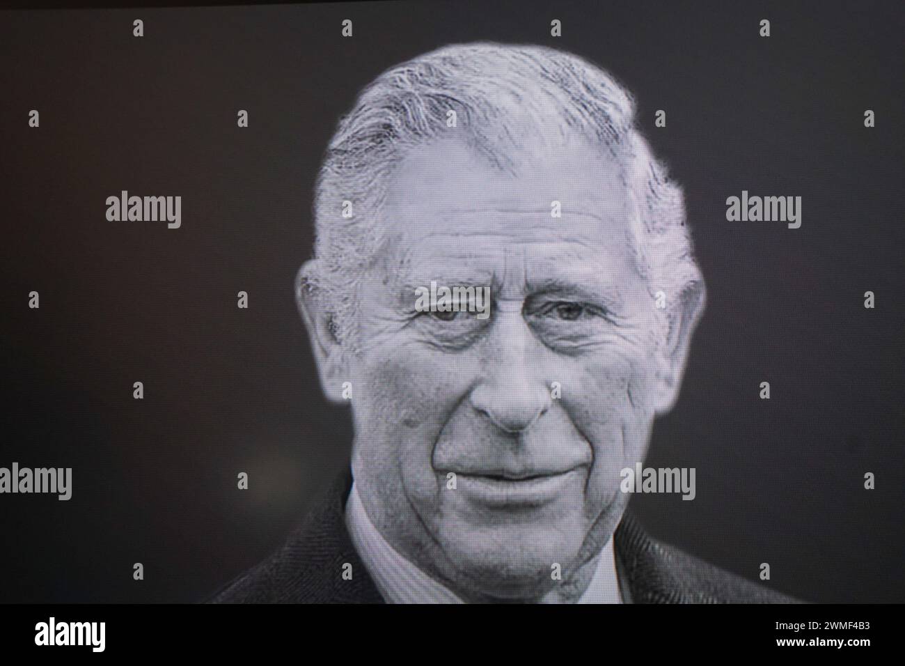 King Charles III portrait displayed on a digital screen Stock Photo - Alamy