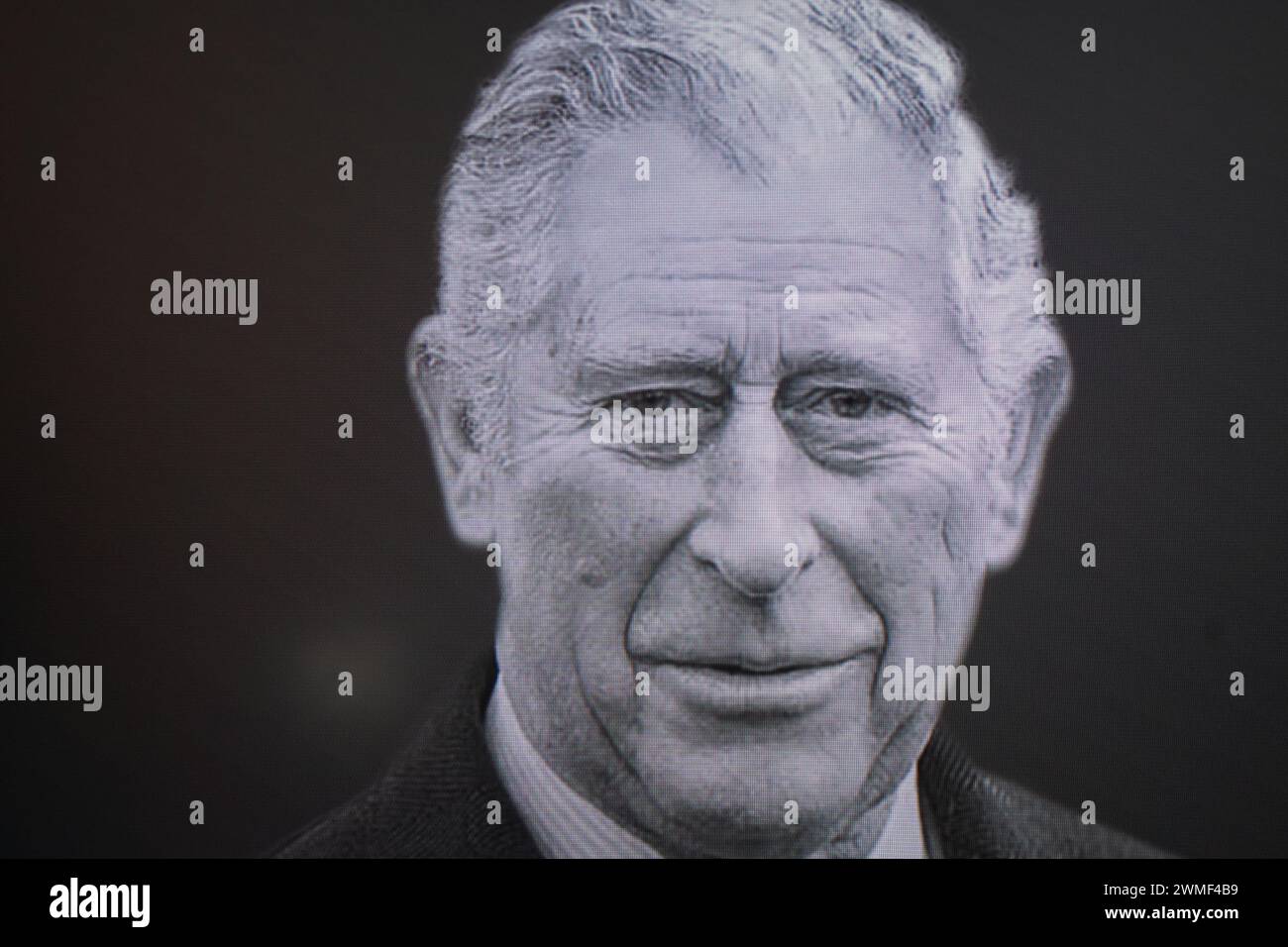 King Charles III portrait displayed on a digital screen Stock Photo - Alamy