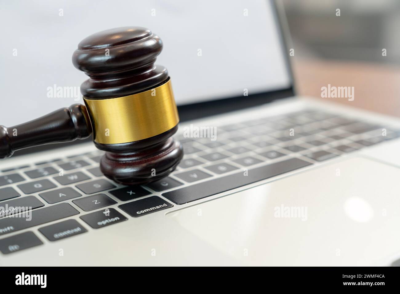 Judgment hammer with computer, Online auction concept Stock Photo - Alamy