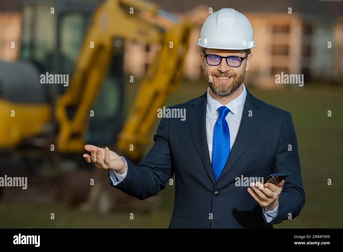Civil engineer worker at a construction site. Mature engineer worker ...