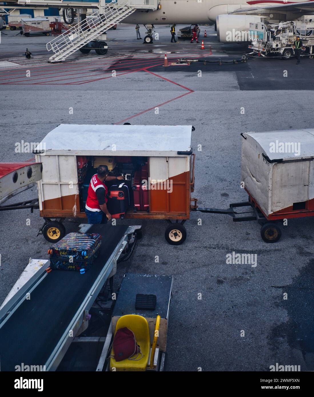 Kuala Lumpur, Malaysia - December 21, 2023: Airport ground crew ...
