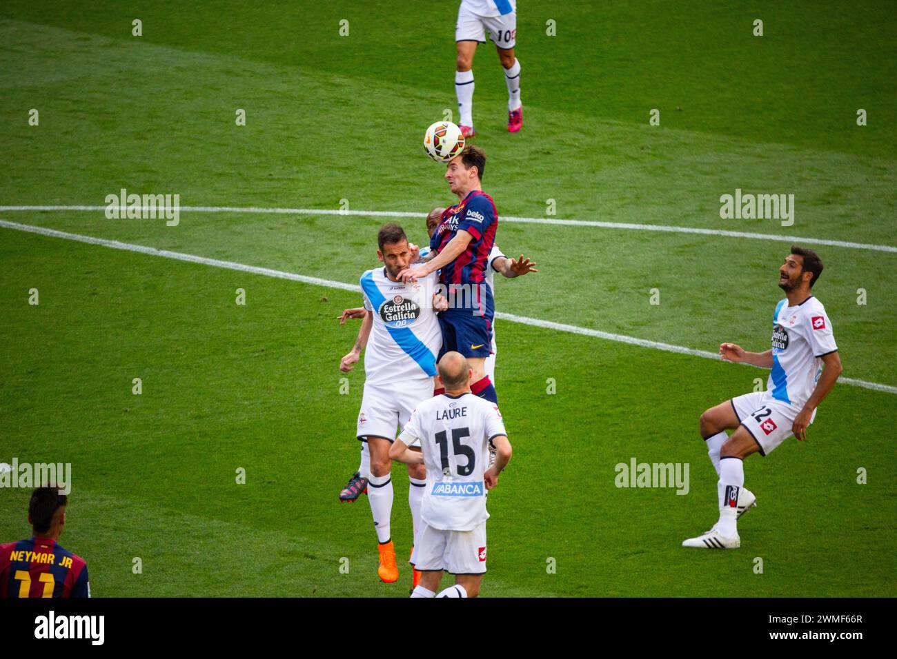LIONEL MESSI, BARCELONA FC, 2015: Lionel Messi leaps high to win a rare ...