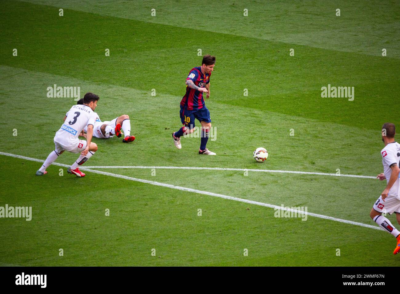 LIONEL MESSI, BARCELONA FC, 2015: Lionel Messi shoots for goal through ...