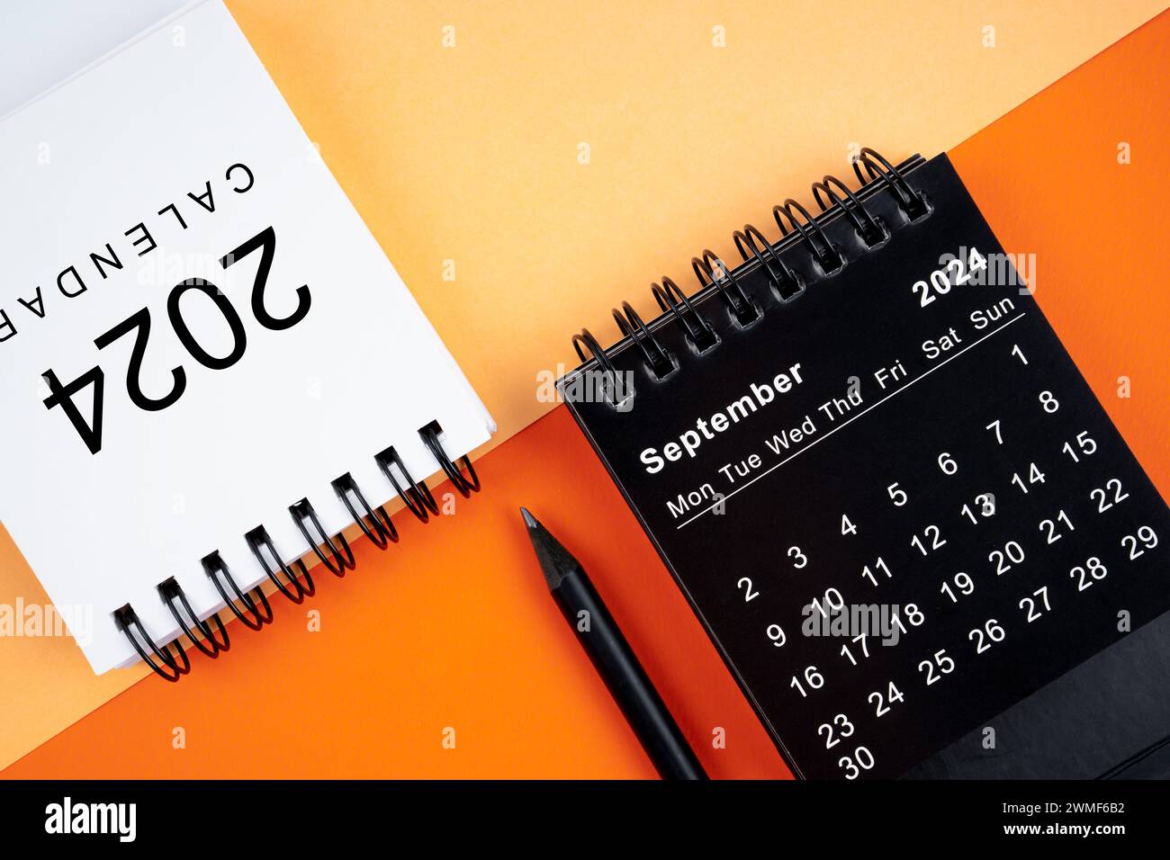 September 2024 desk calendar black and white color with pencil on ...