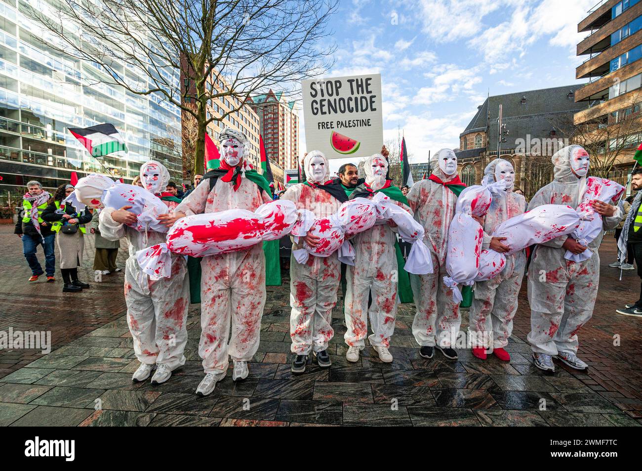 Demonstrators hold death shrouds symbolizing infant deaths in Gaza ...