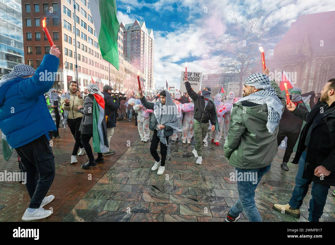 Demonstrators hold torches during the Open Off Rafah protest. HANDS OFF ...