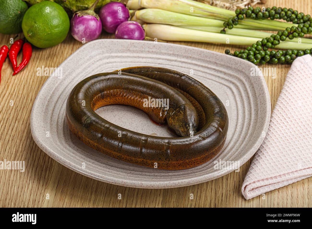 Fresh raw uncooked eel for grill in the bowl Stock Photo - Alamy