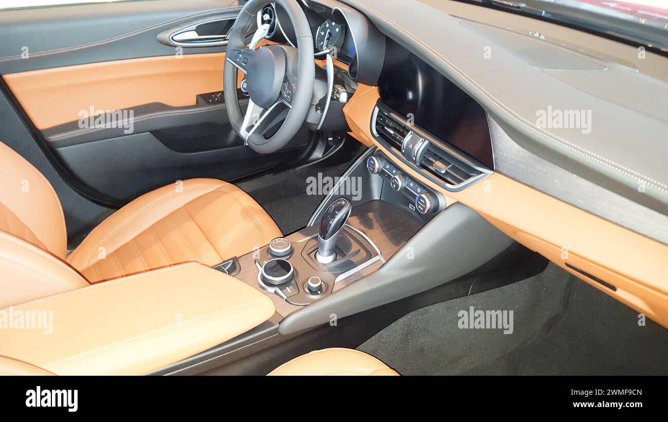 Modern sport car yellow brown leather interior Stock Photo - Alamy