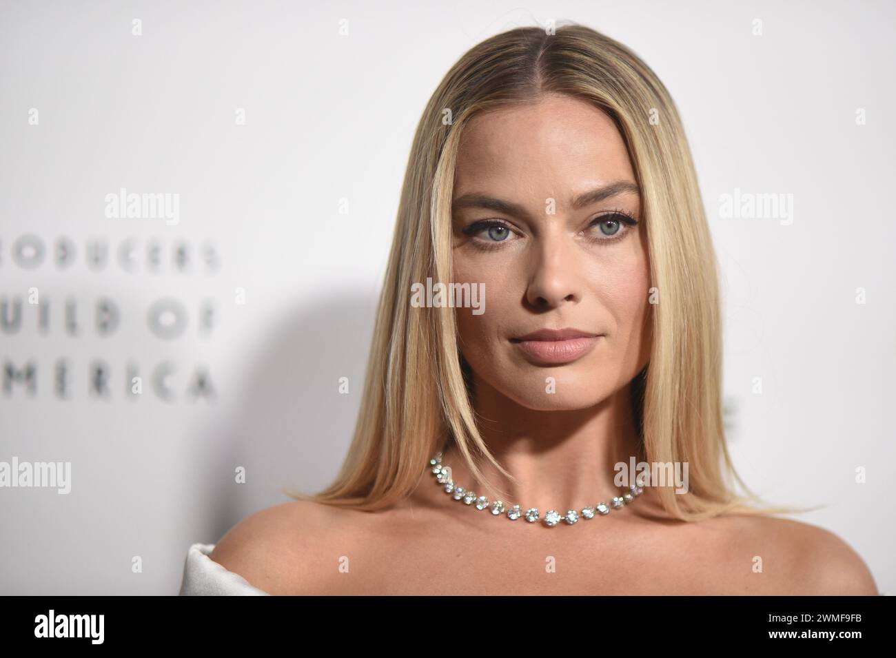 Margot Robbie arrives at the 35th Annual Producers Guild Awards on ...