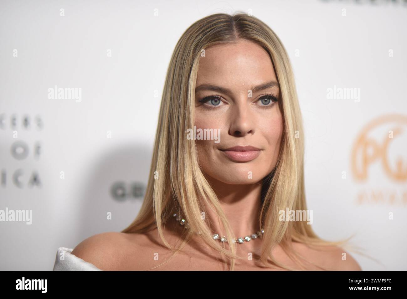 Margot Robbie arrives at the 35th Annual Producers Guild Awards on ...