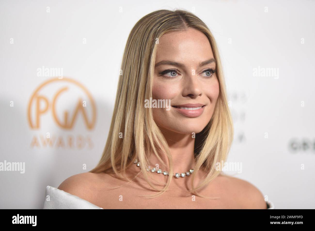 Margot Robbie arrives at the 35th Annual Producers Guild Awards on ...