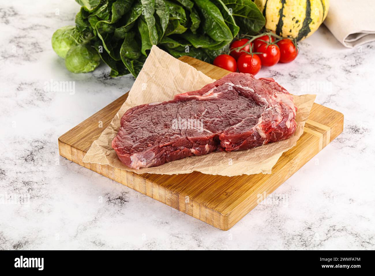 Raw rib eye beef premium steak for grill Stock Photo - Alamy