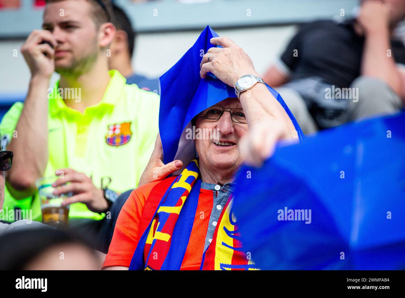 A spain fan in crowd before match hi-res stock photography and images ...