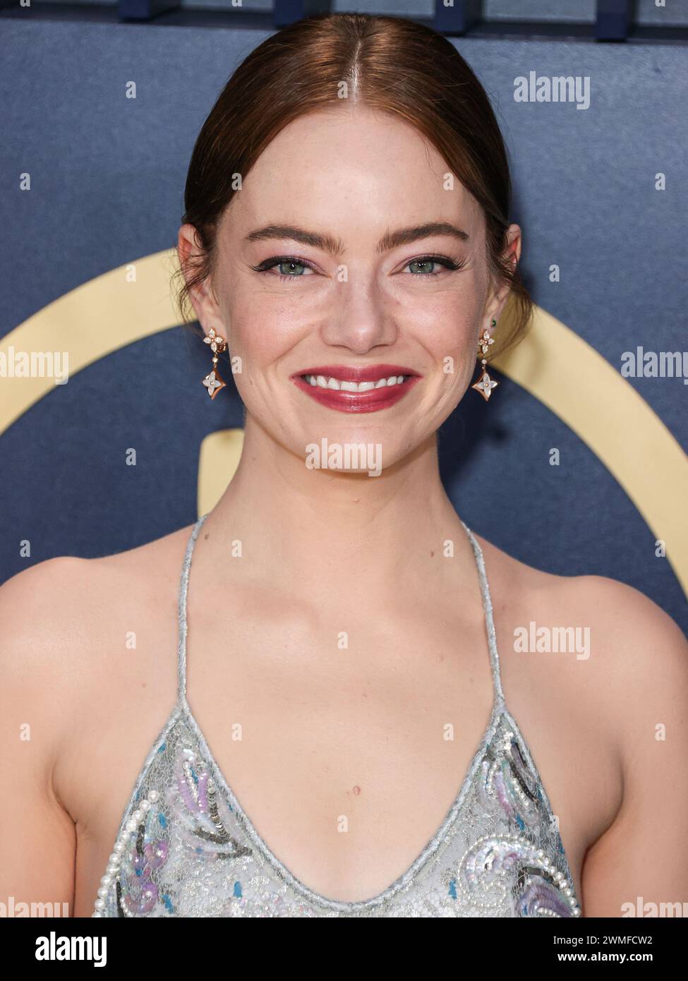 LOS ANGELES, CALIFORNIA, USA - FEBRUARY 24: Emma Stone wearing a Louis ...