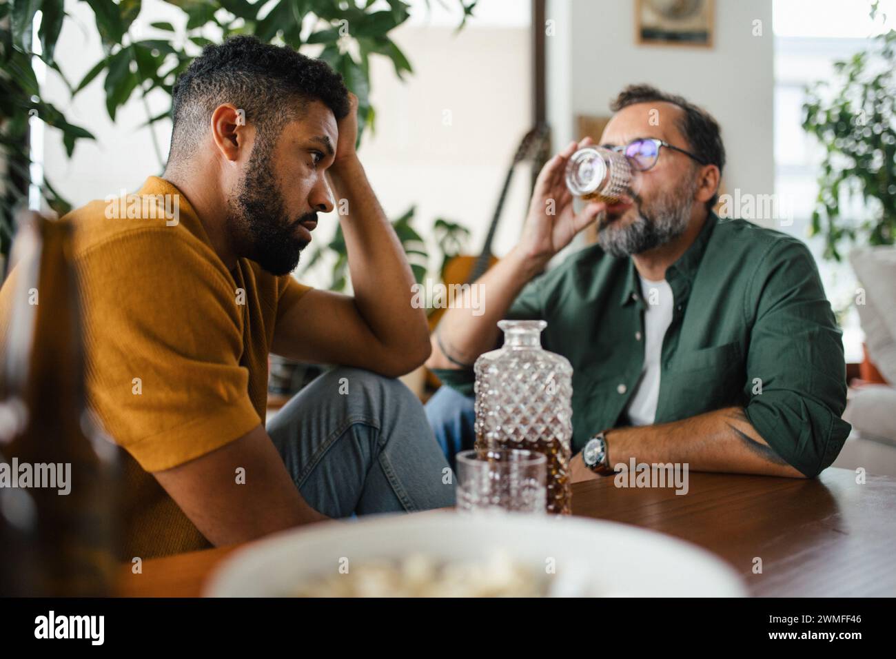 Best friends, supporting each other, drinking whiskey and talking ...