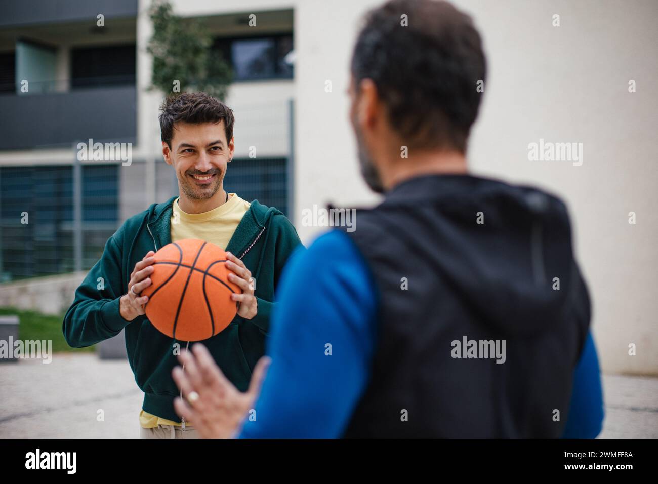 Best friends playing sport outdoors, having fun, competing. Playing ...