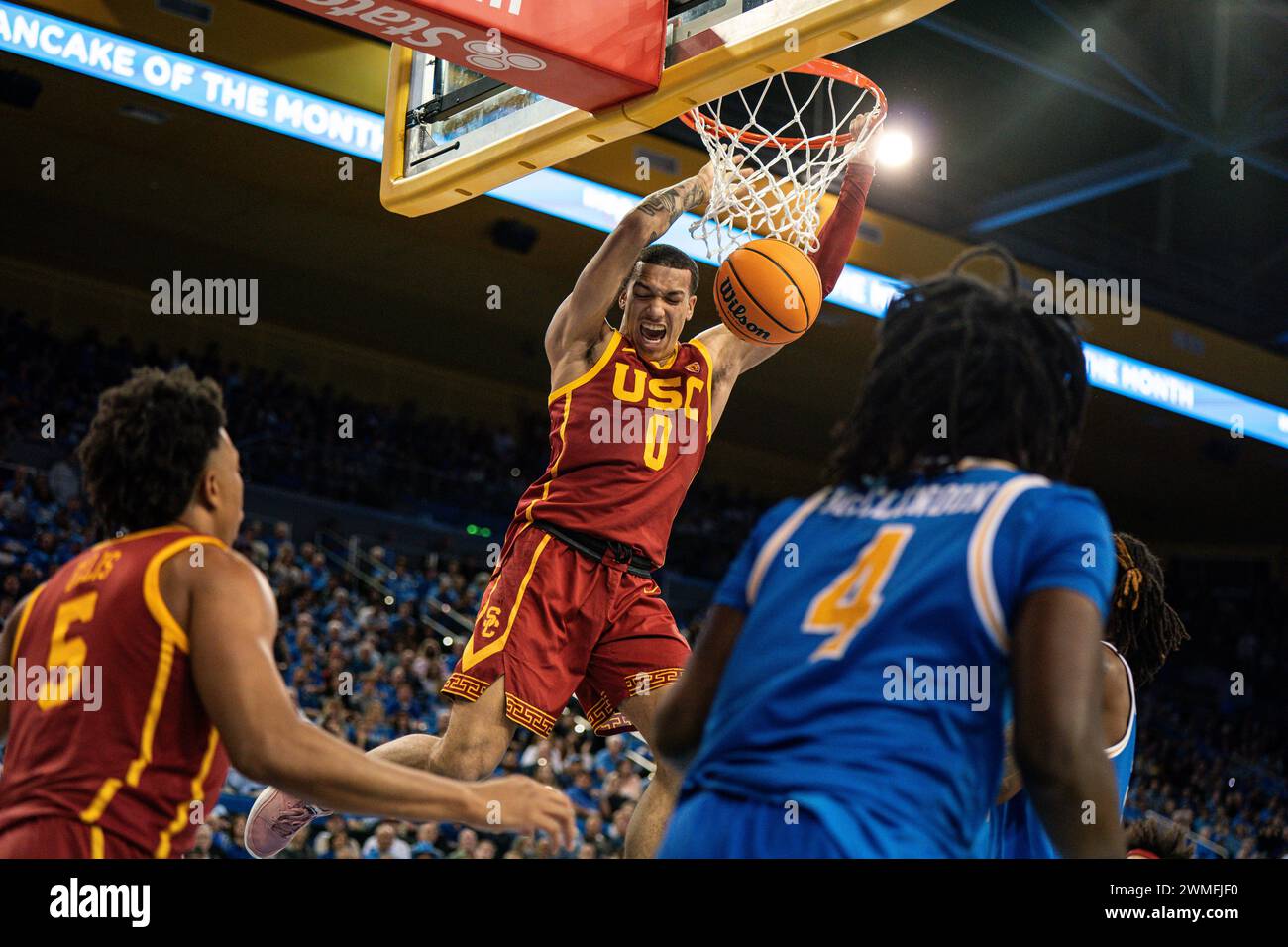 USC Trojans guard Kobe Johnson (0) dunks during a NCAA basketball game ...