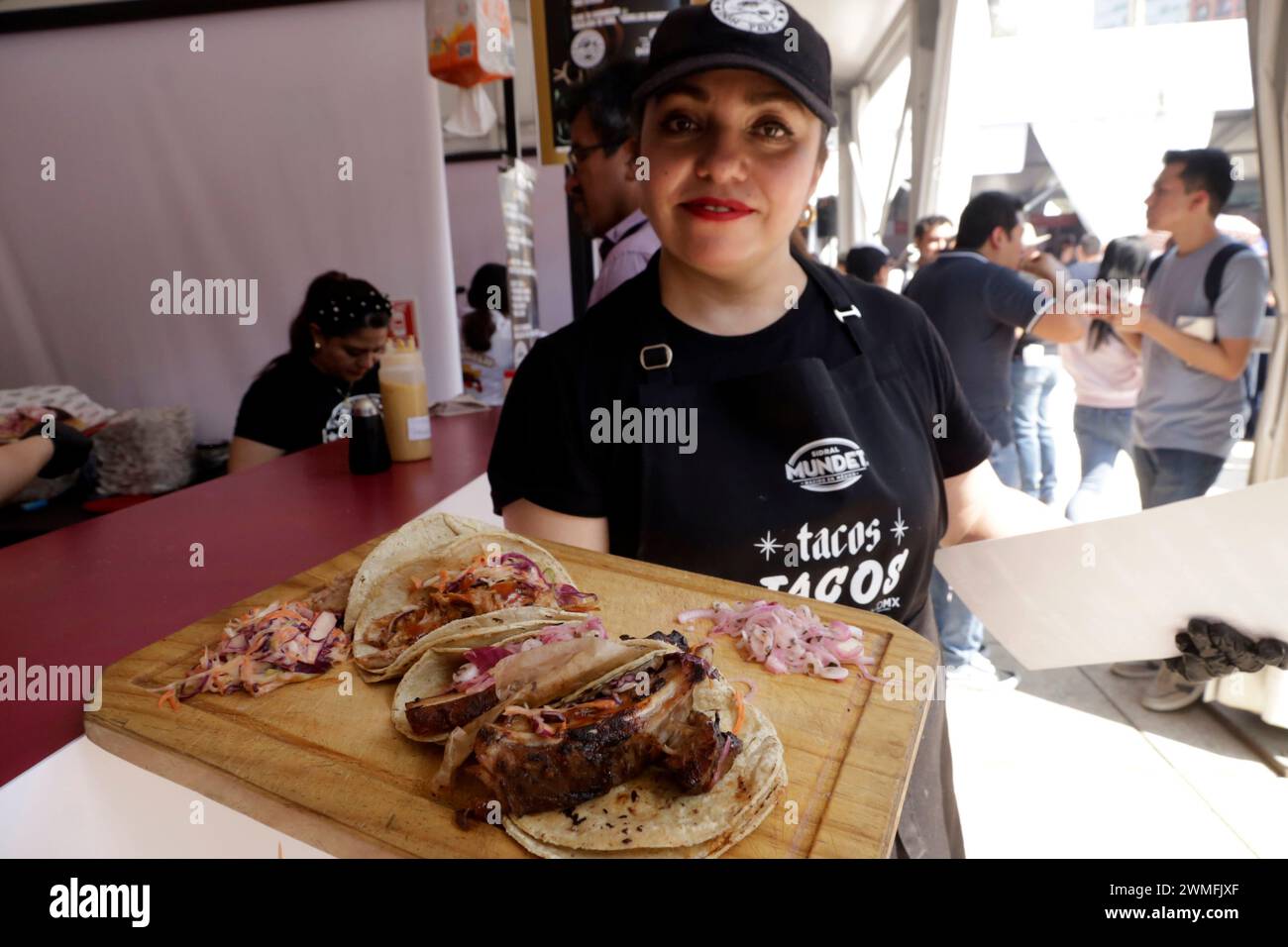 Non Exclusive: February 24, 2024, Mexico City, Mexico: A woman offers ...