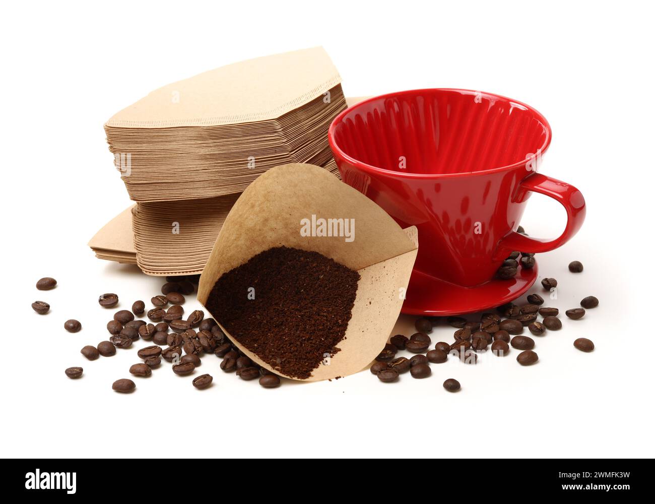 Coffee cone with filter paper full of coffee on white background Stock ...